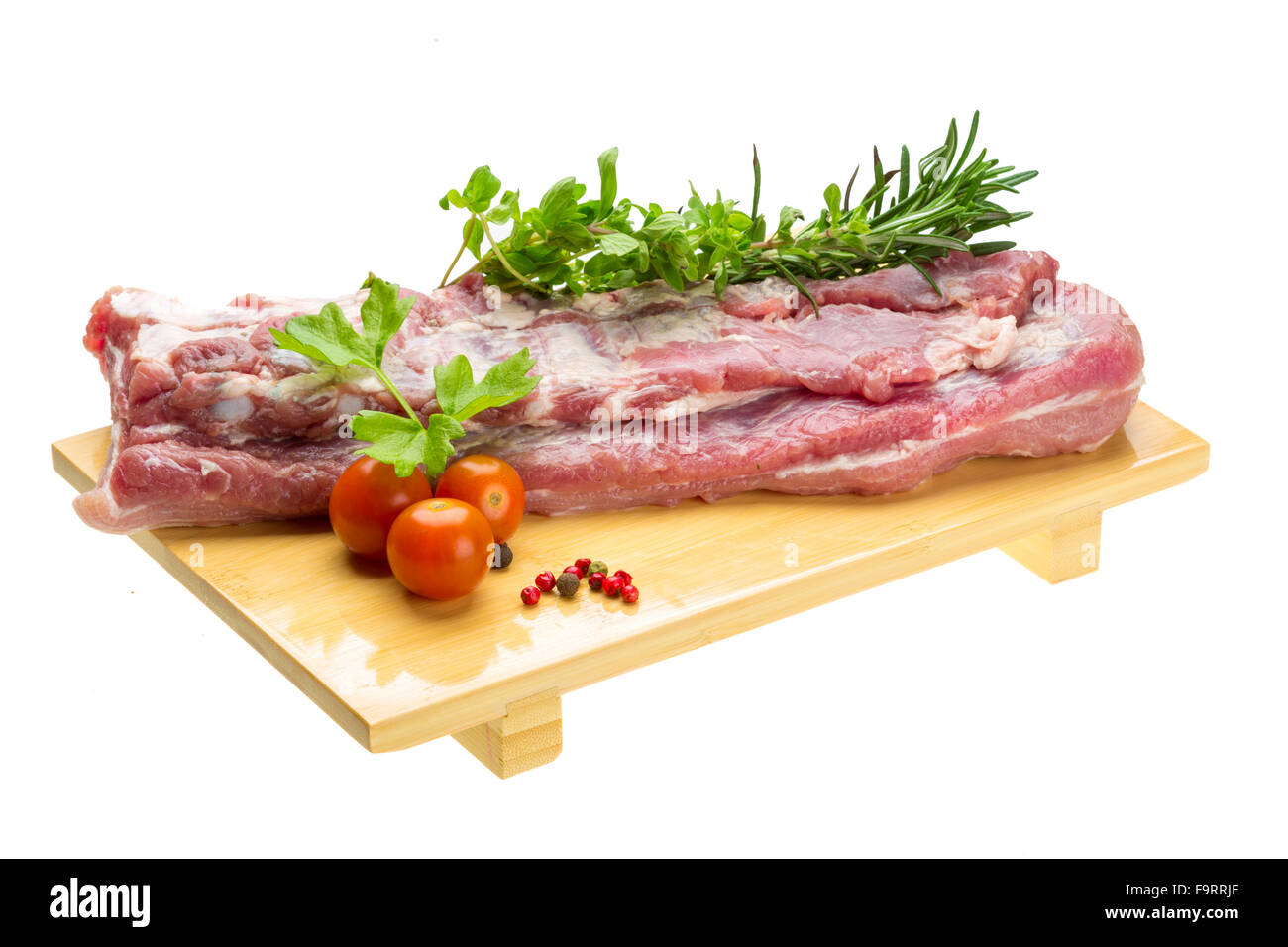 Raw pork meat with herbs and spices Stock Photo - Alamy