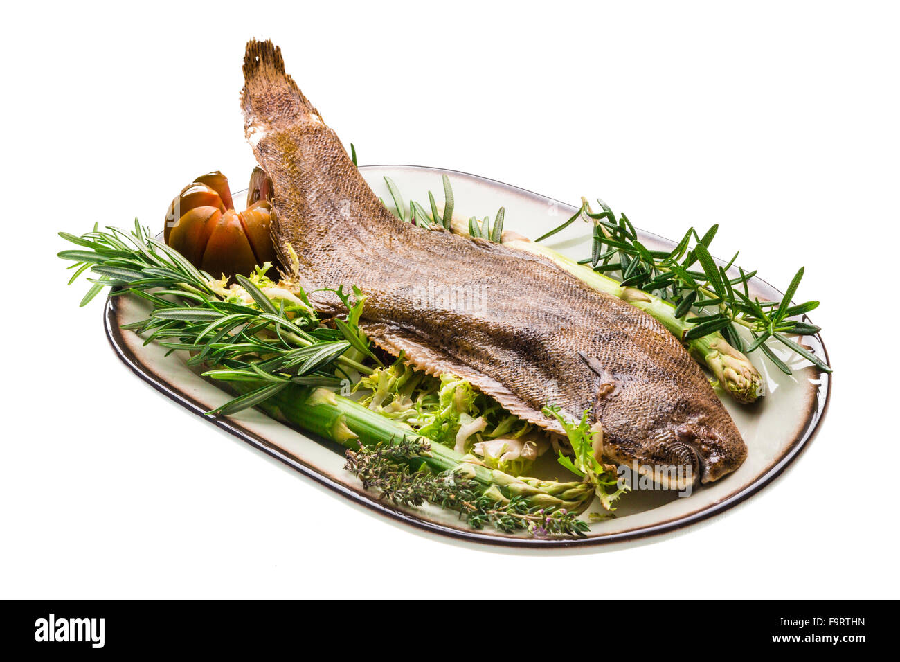 Fish Dover sole roasted Stock Photo - Alamy