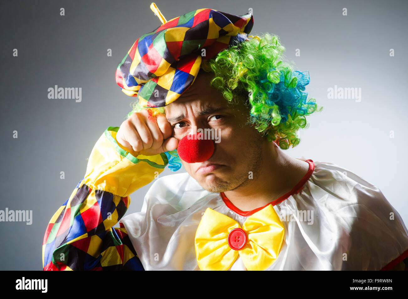 Funny clown in comical concept Stock Photo - Alamy