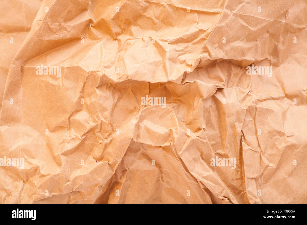 Closeup of brown wrinkled paper texture background Stock Photo - Alamy