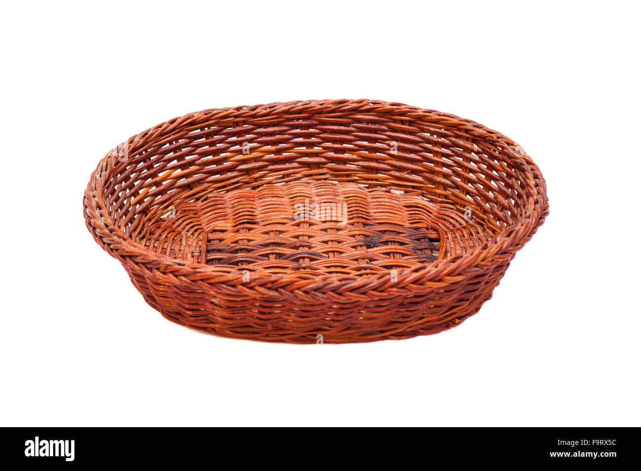 Brown wicker basket isolated on white background Stock Photo - Alamy