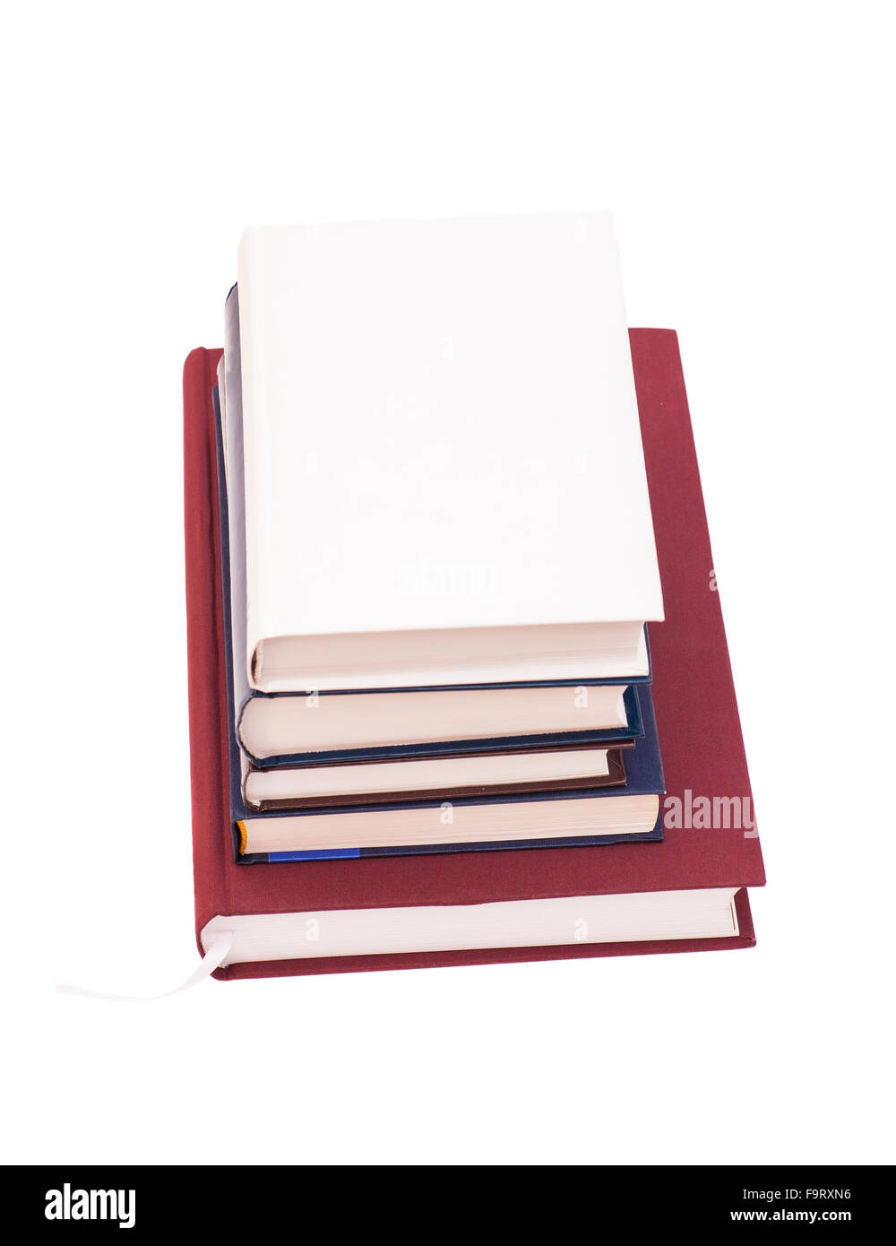 stack of color books on white background Stock Photo - Alamy