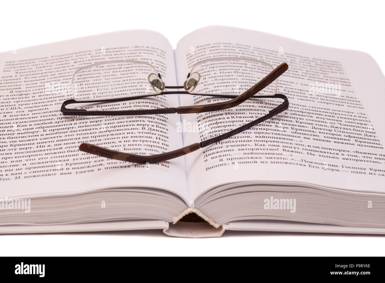 Open Book With Eyeglasses Stock Photo - Alamy