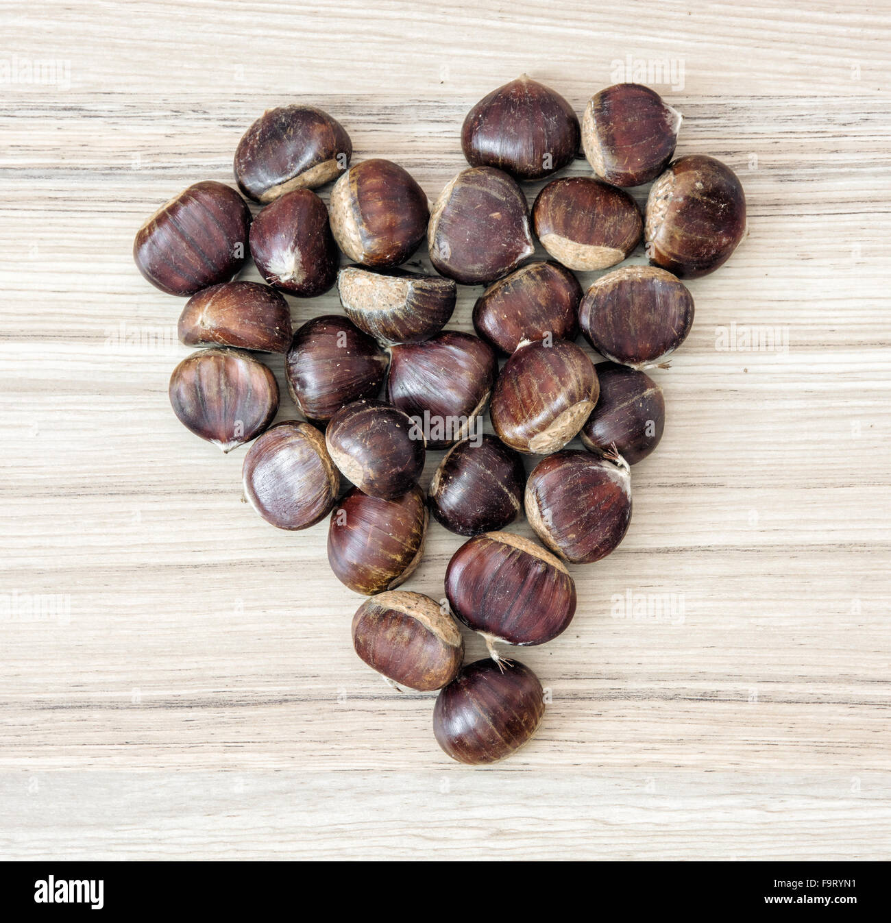 Chestnuts in the heart shape. Valentine's day. Seasonal theme Stock ...