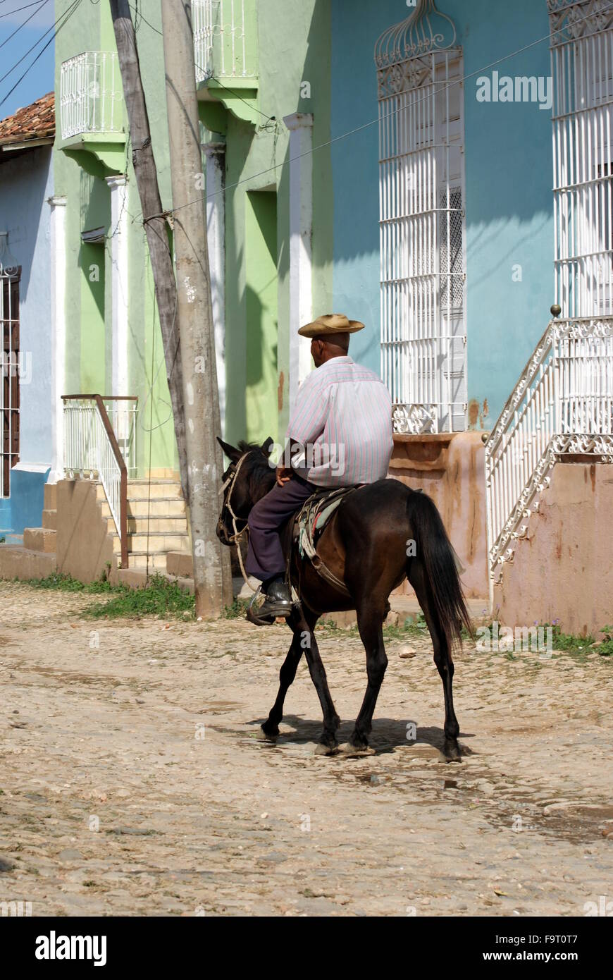 Back view man horseback hi-res stock photography and images - Alamy