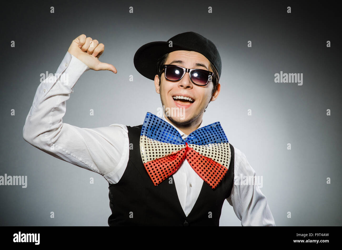 Funny man with giant bow tie Stock Photo - Alamy