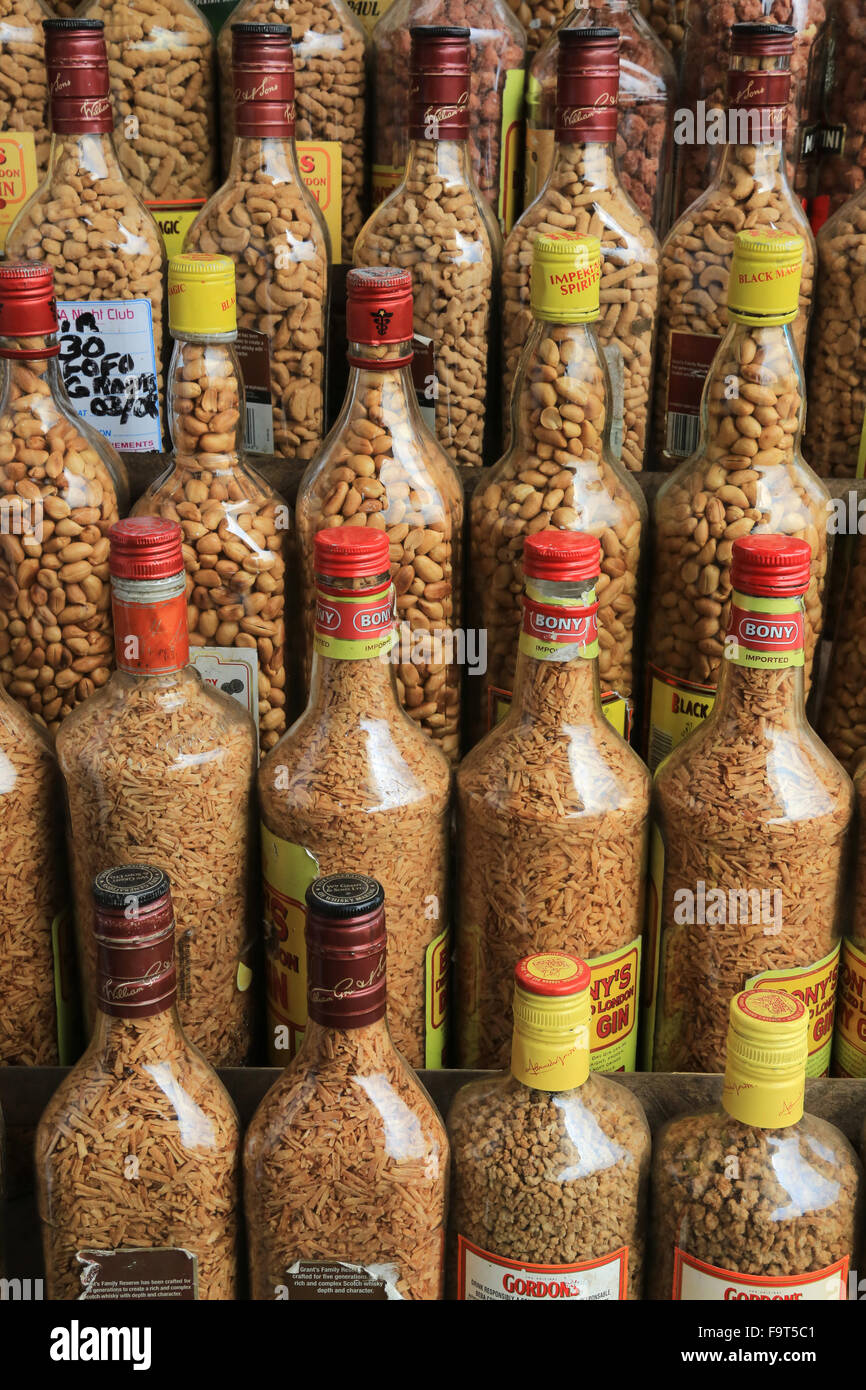 Peanuts sold in glass bottles Stock Photo - Alamy