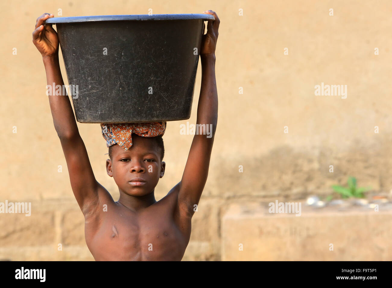 Carrying a bucket hi-res stock photography and images - Alamy