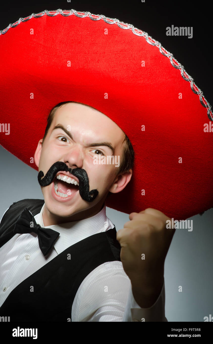 Person wearing sombrero hat in funny concept Stock Photo - Alamy