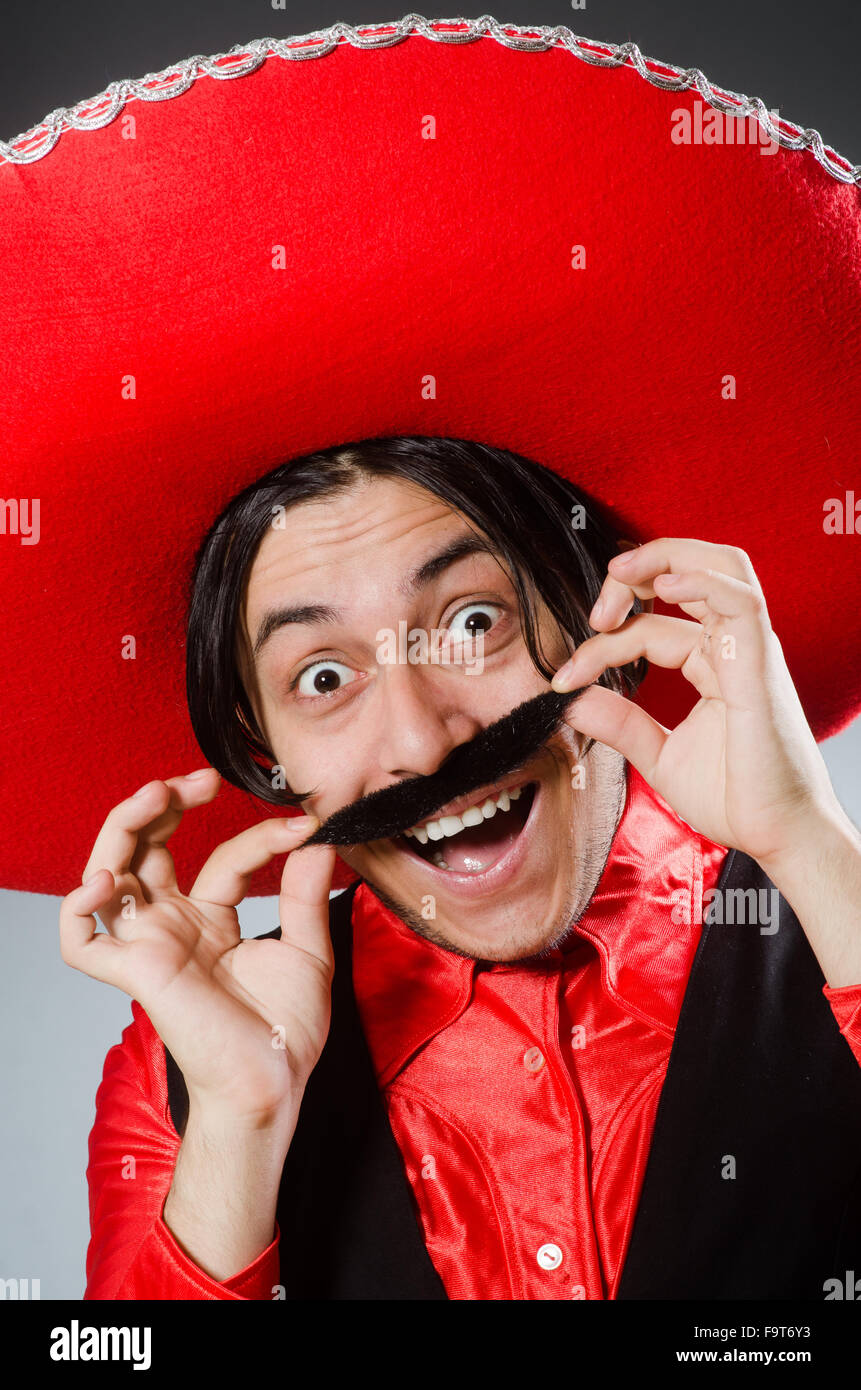 Person wearing sombrero hat in funny concept Stock Photo - Alamy