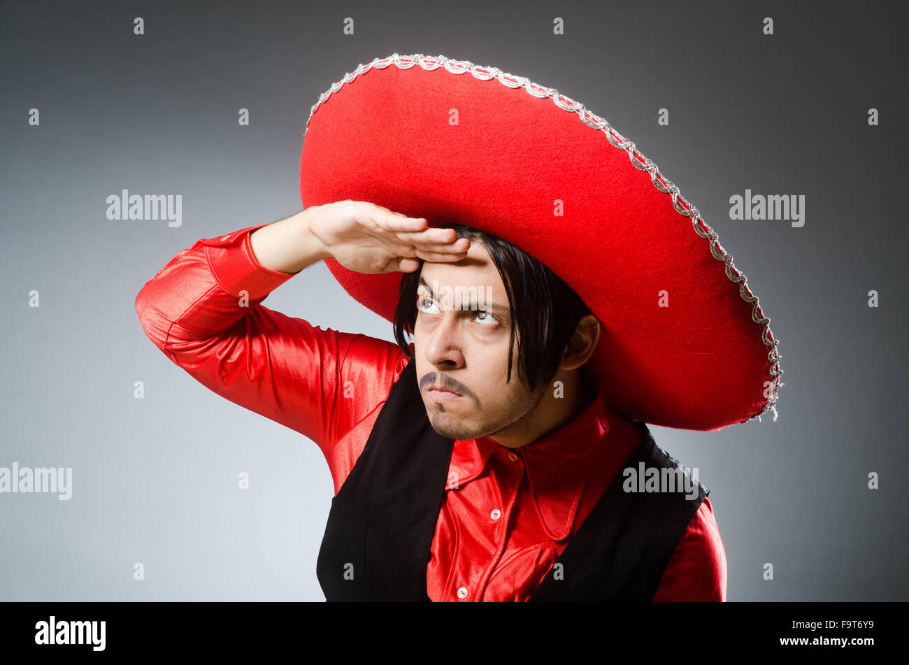 Person wearing sombrero hat in funny concept Stock Photo - Alamy