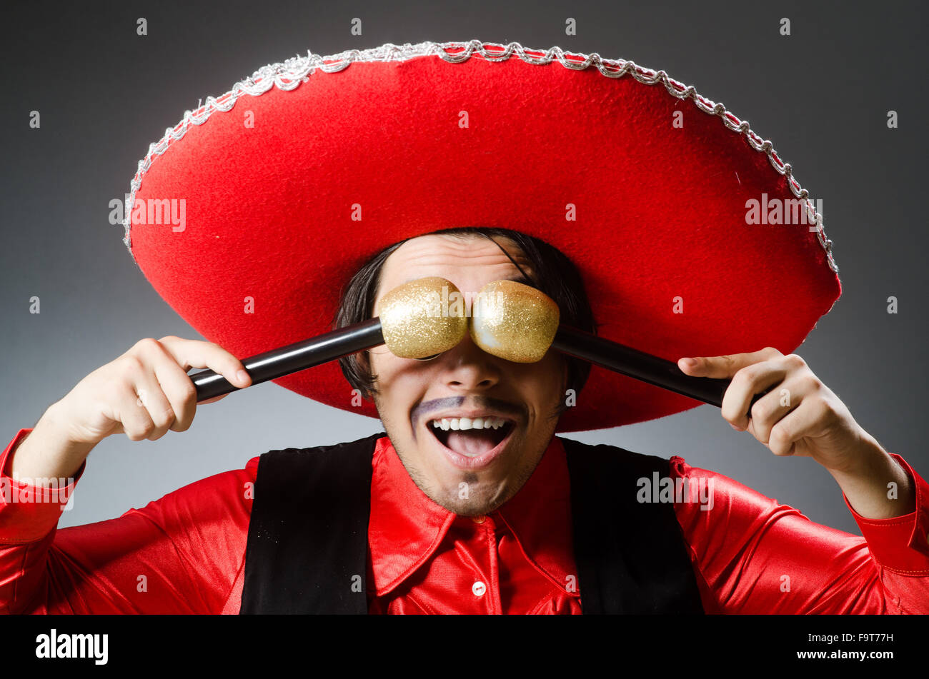 Person wearing sombrero hat in funny concept Stock Photo - Alamy