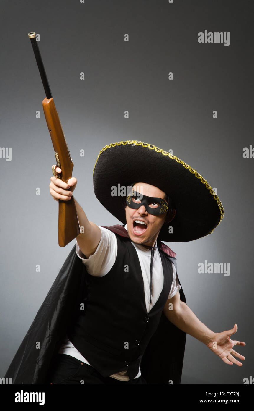 Person wearing sombrero hat in funny concept Stock Photo - Alamy