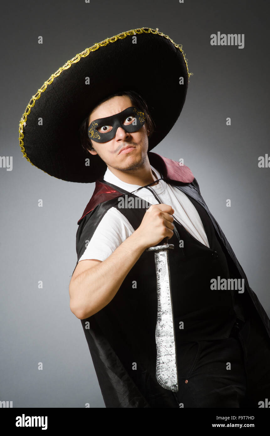 Person wearing sombrero hat in funny concept Stock Photo - Alamy