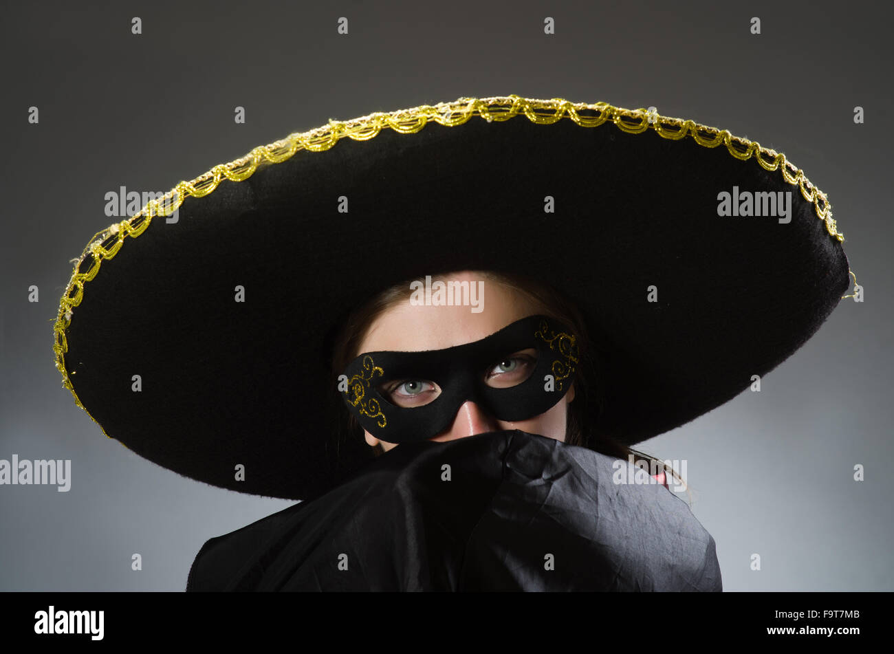 Person wearing sombrero hat in funny concept Stock Photo - Alamy