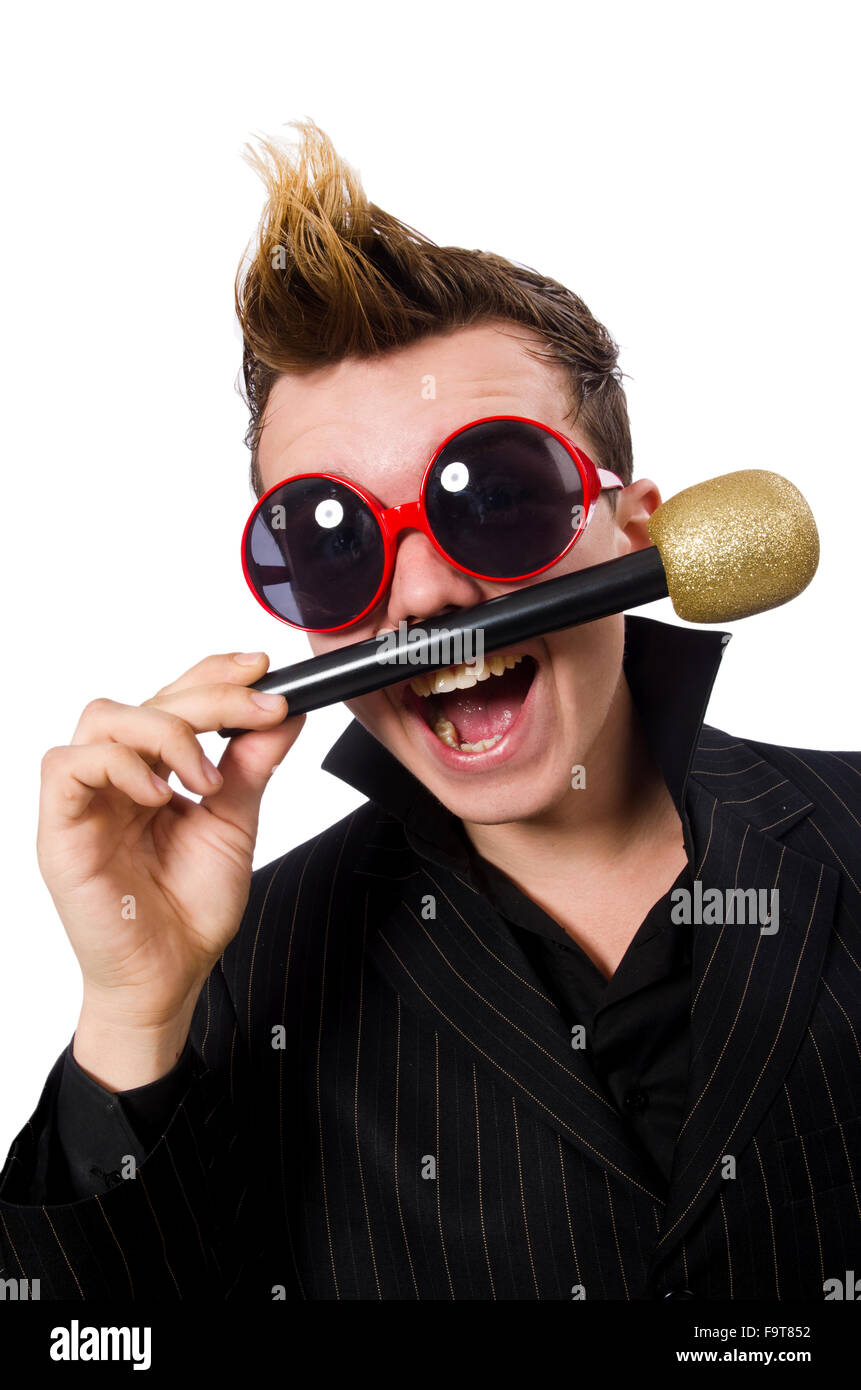 Singing man in karaoke concept Stock Photo - Alamy