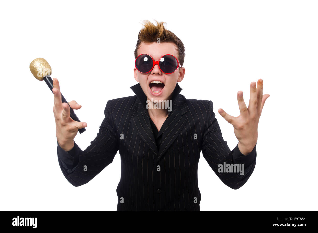 Singing man in karaoke concept Stock Photo - Alamy