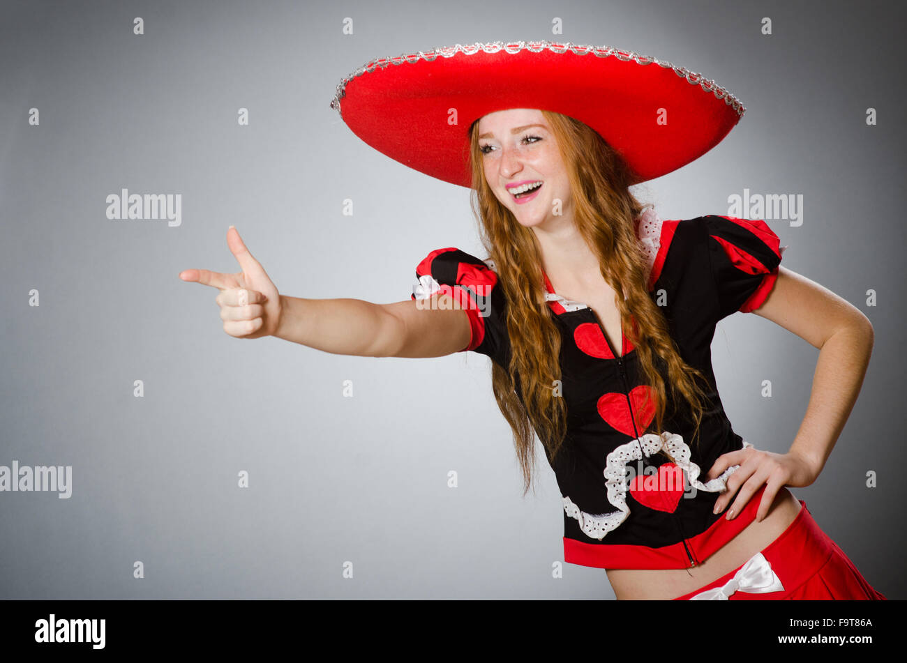 Mexican woman wearing sombrero hat Stock Photo - Alamy