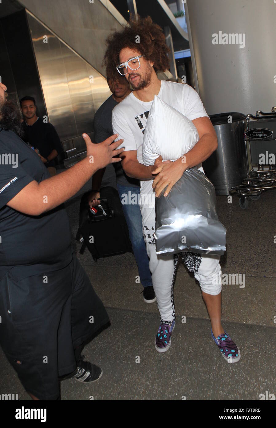 Redfoo at Los Angeles International Airport (LAX) wearing a Tshirt with ...