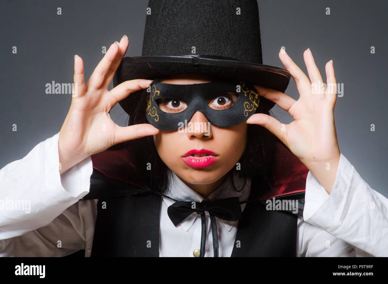 Woman magician in funny concept Stock Photo - Alamy