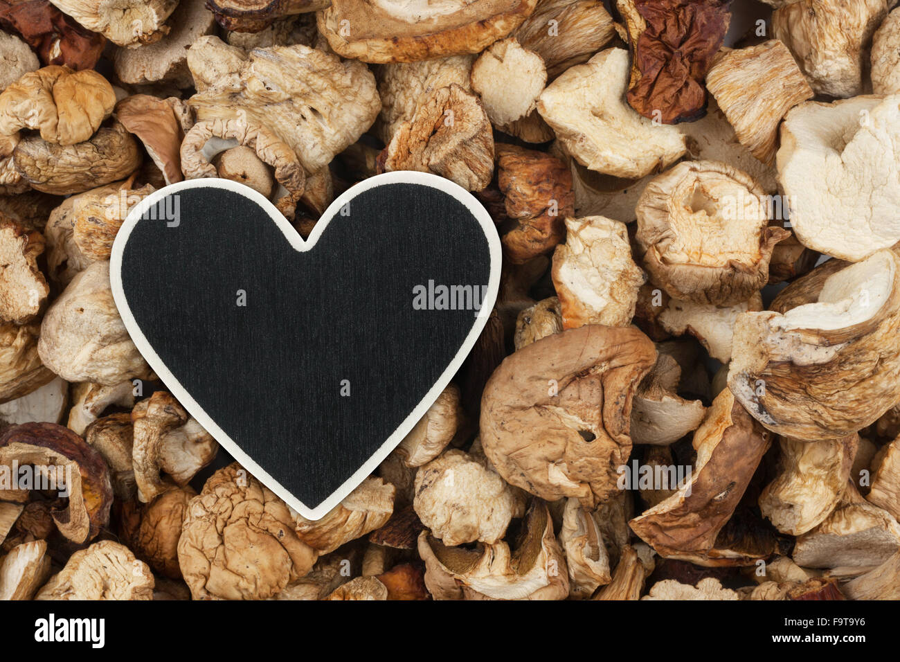 Heart pointer, the price tag lies on dried mushroom, with space for ...