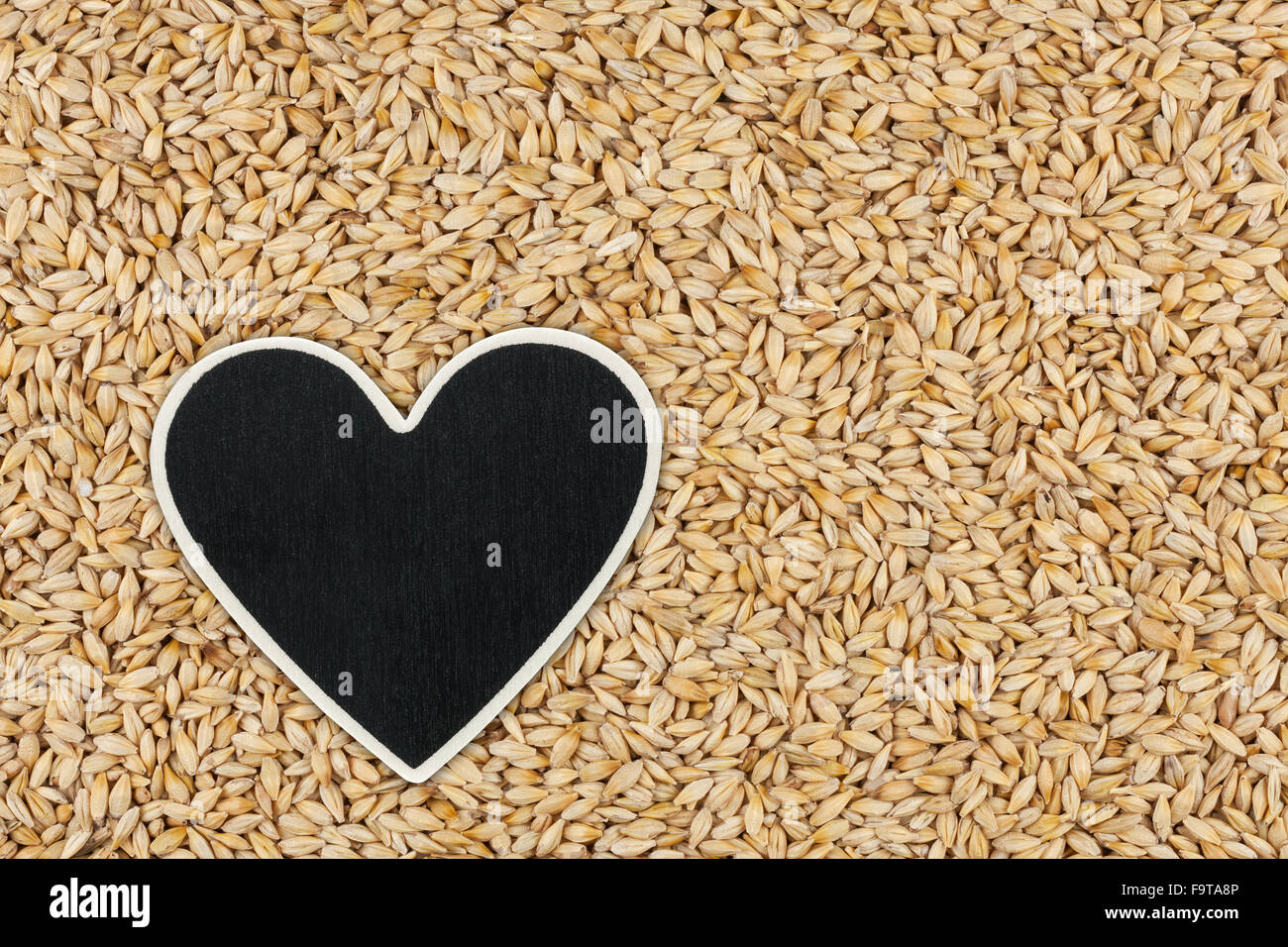 Heart pointer, the price tag lies on grains barley, with space for your ...