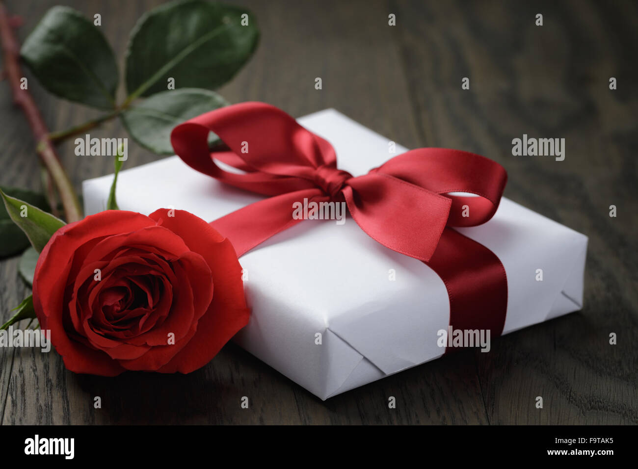 present box with rose flower Stock Photo - Alamy