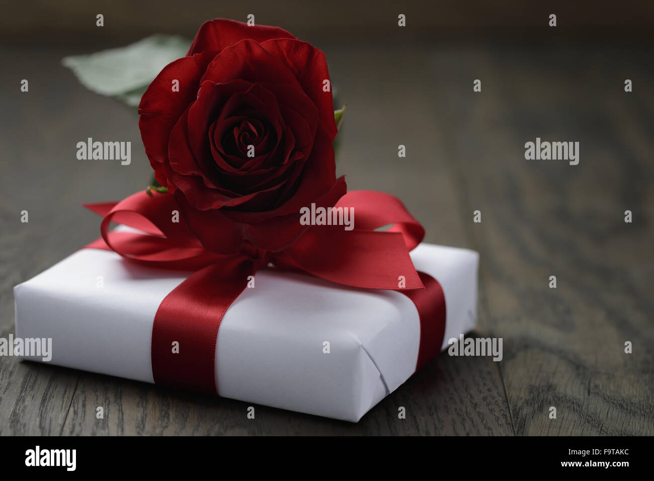 present box with rose flower Stock Photo - Alamy