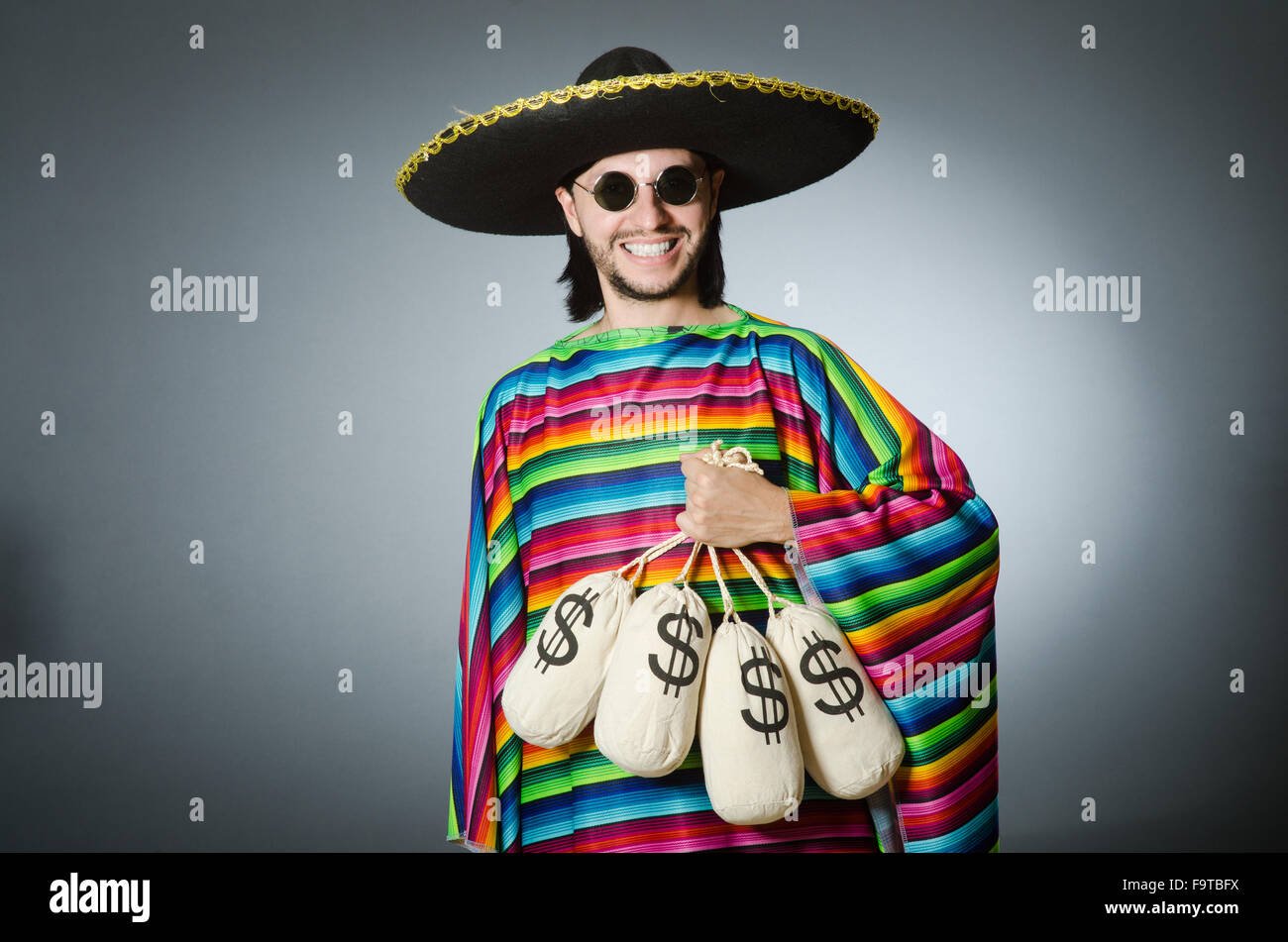 Mexican man with money sacks Stock Photo - Alamy