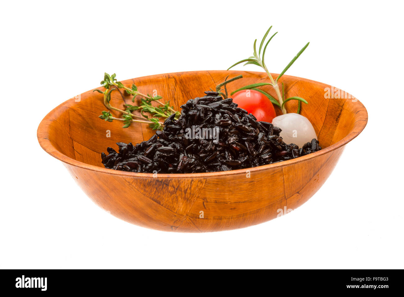 Black boiled rice with thyme Stock Photo - Alamy