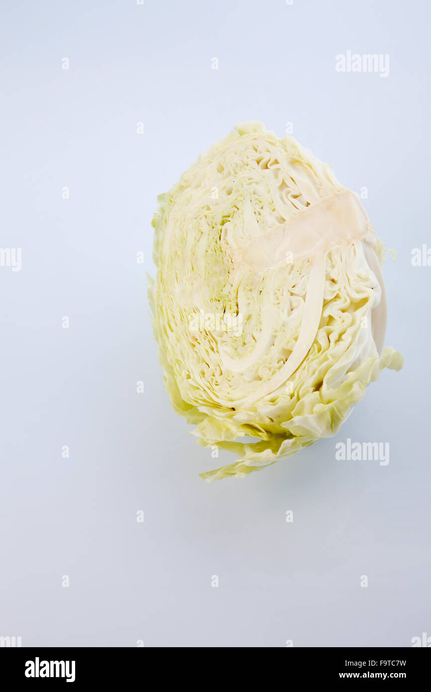 Cabbage cut in half isolated on white background Stock Photo - Alamy