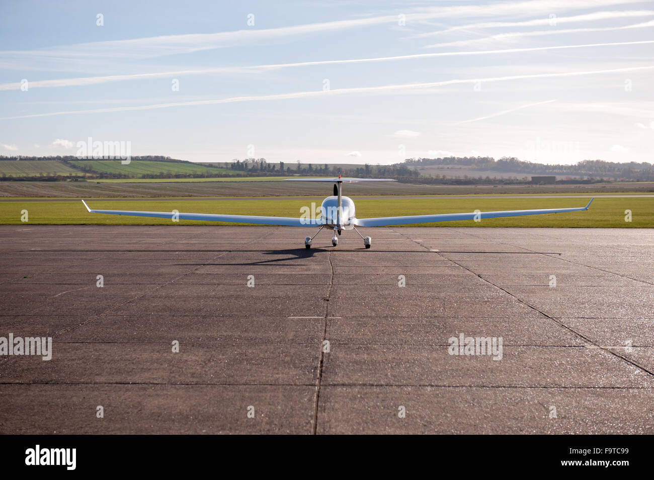 Back of Aircraft on air field in late evening Stock Photo - Alamy