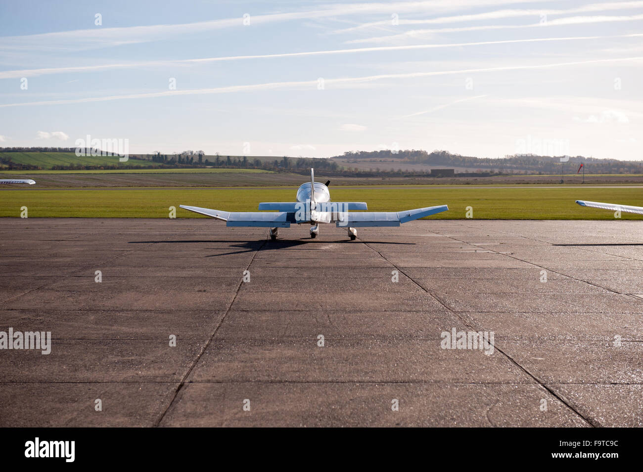 Back of Aircraft on air field in late evening Stock Photo - Alamy