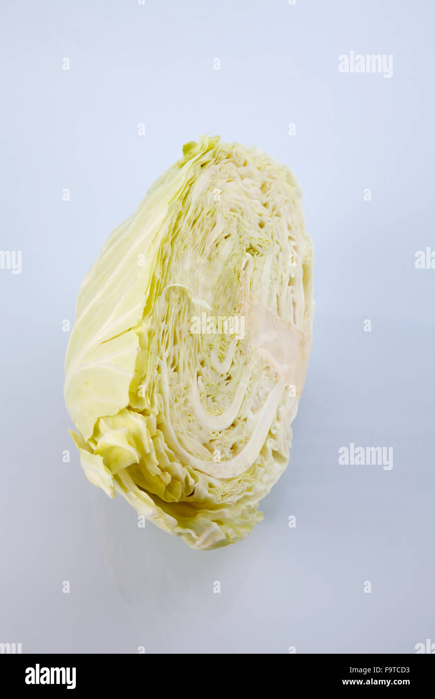 Cabbage cut in half isolated on white background Stock Photo - Alamy