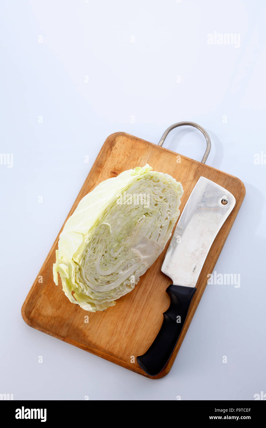 Cabbage cut in half isolated on white background Stock Photo - Alamy