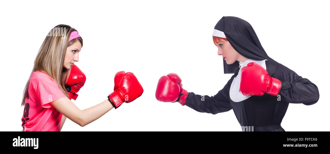 Sportsman and nun boxing isolated on white Stock Photo - Alamy