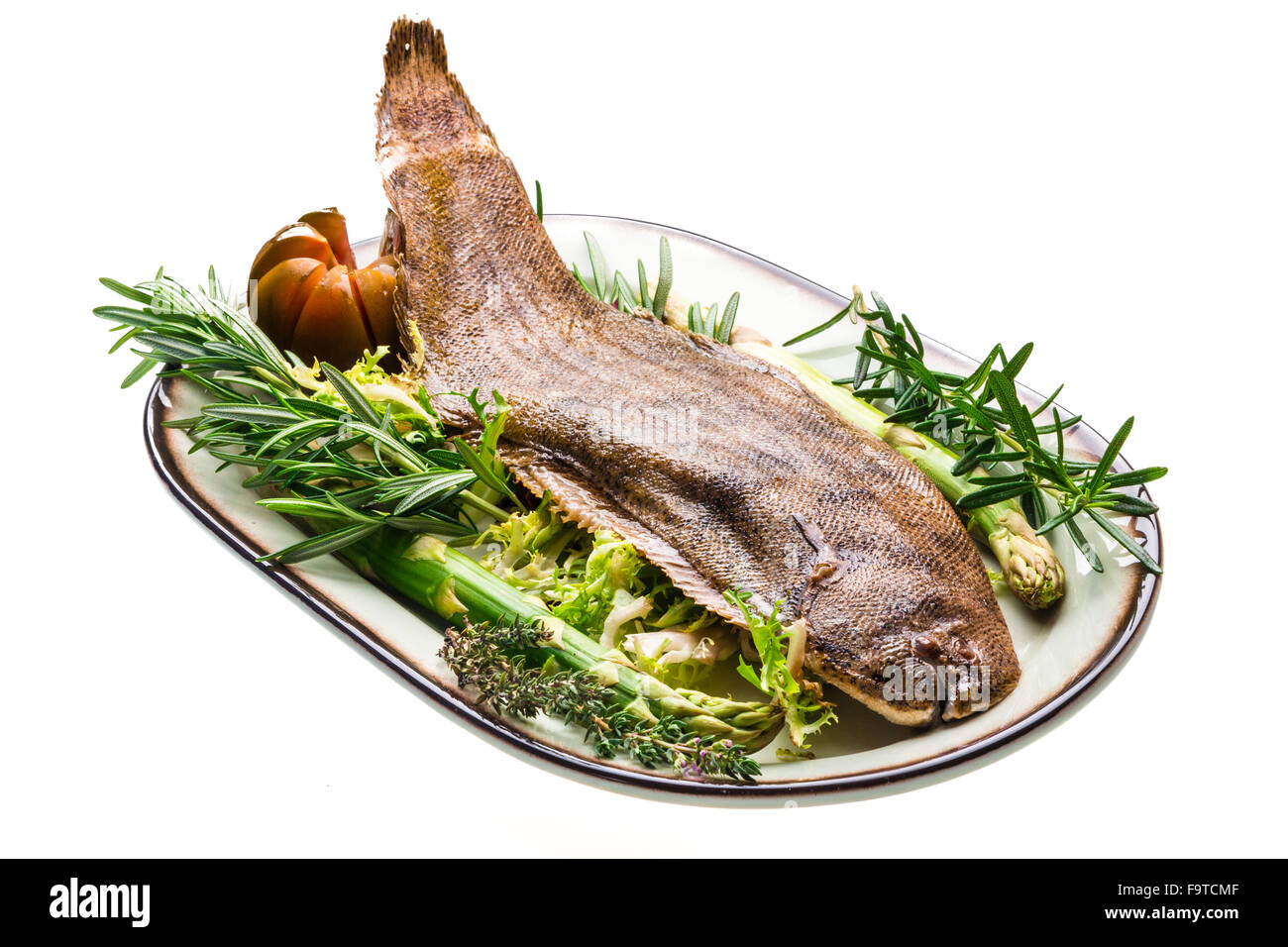 Fish Dover sole roasted Stock Photo - Alamy