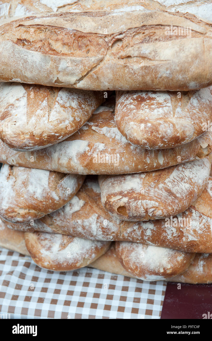 Large stack of fresh bread at market Stock Photo - Alamy