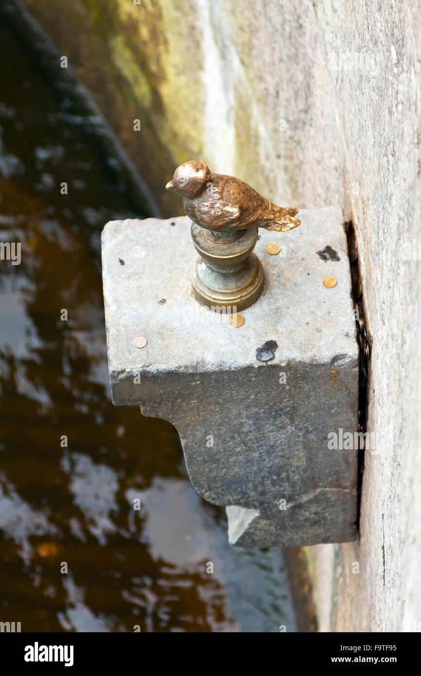 Chizhik-Pyzhik statue at embankment of Fontanka River. Saint Petersburg ...