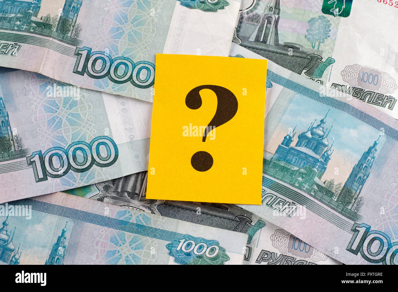 Question mark on russian ruble banknotes Stock Photo - Alamy