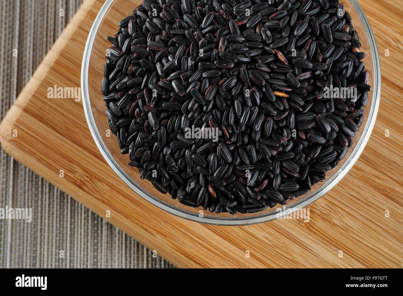 Black rice in a bowl Stock Photo - Alamy