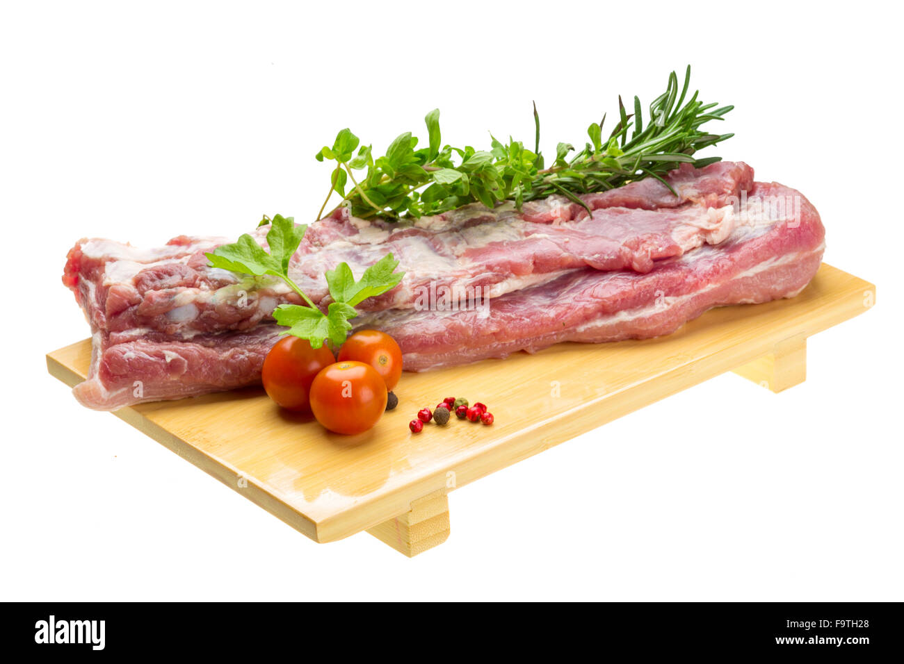Raw pork meat with herbs and spices Stock Photo - Alamy