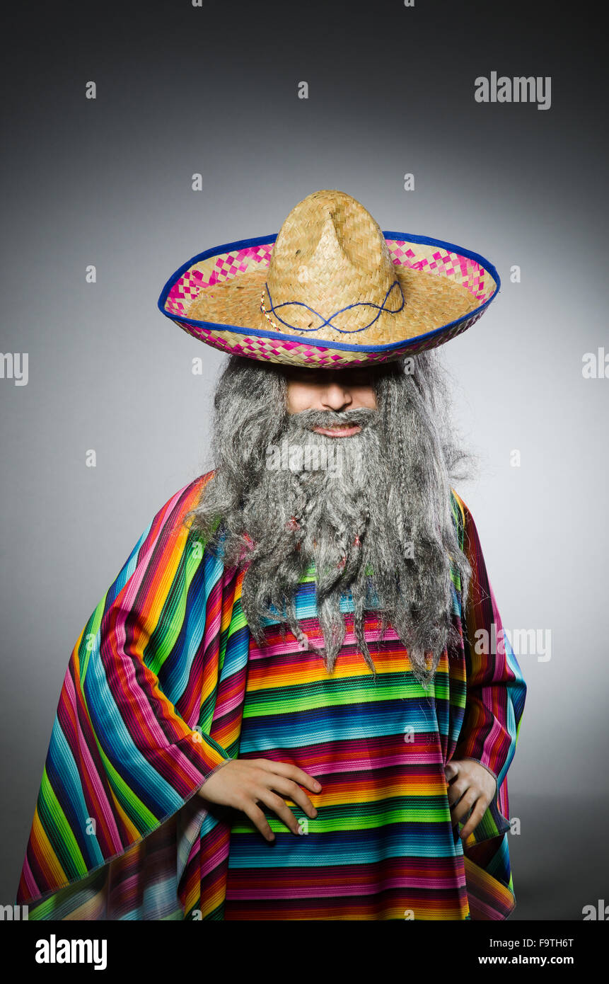 Person wearing sombrero hat in funny concept Stock Photo - Alamy