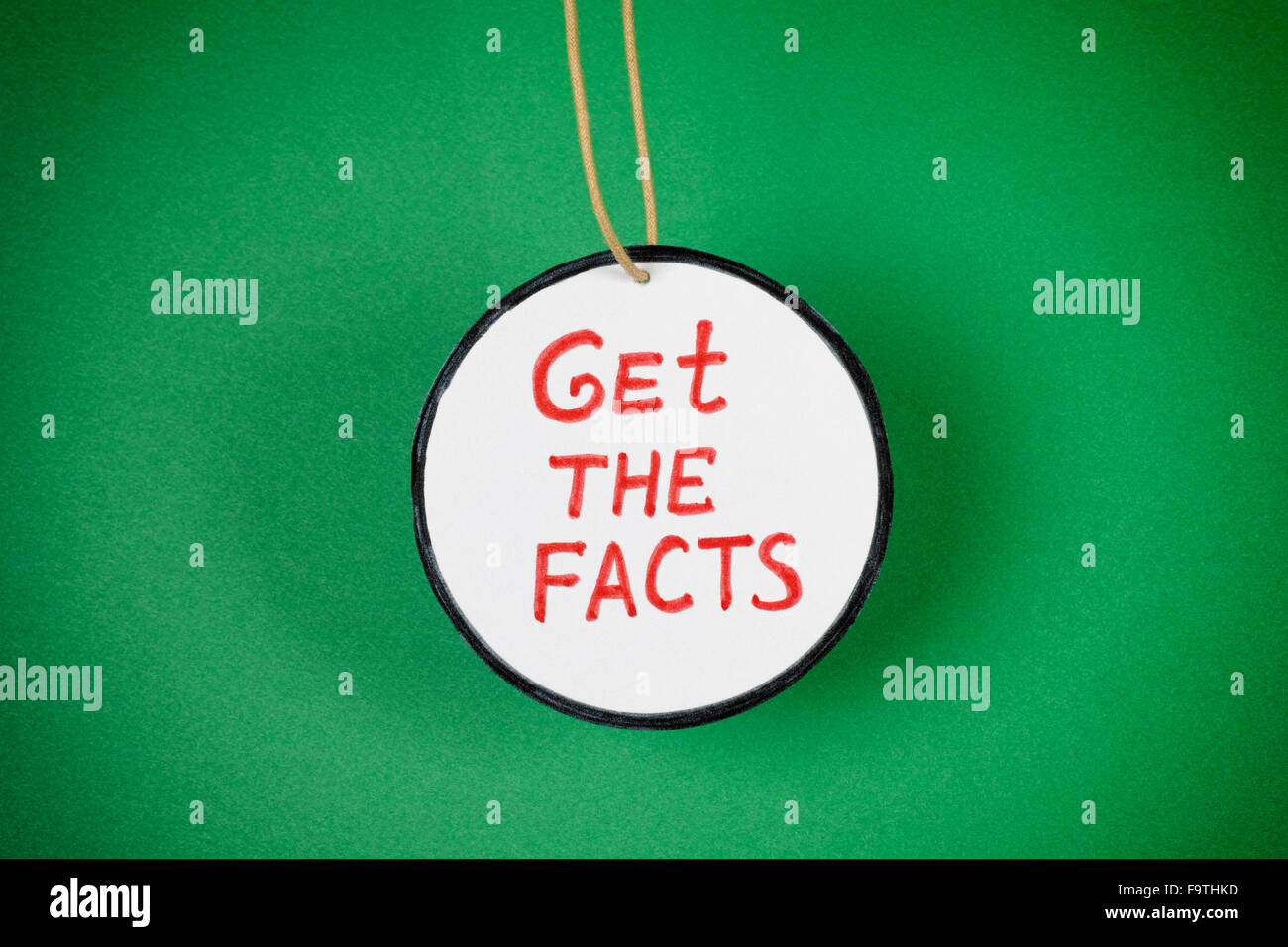 Get the facts. Green background. Vignette Stock Photo - Alamy