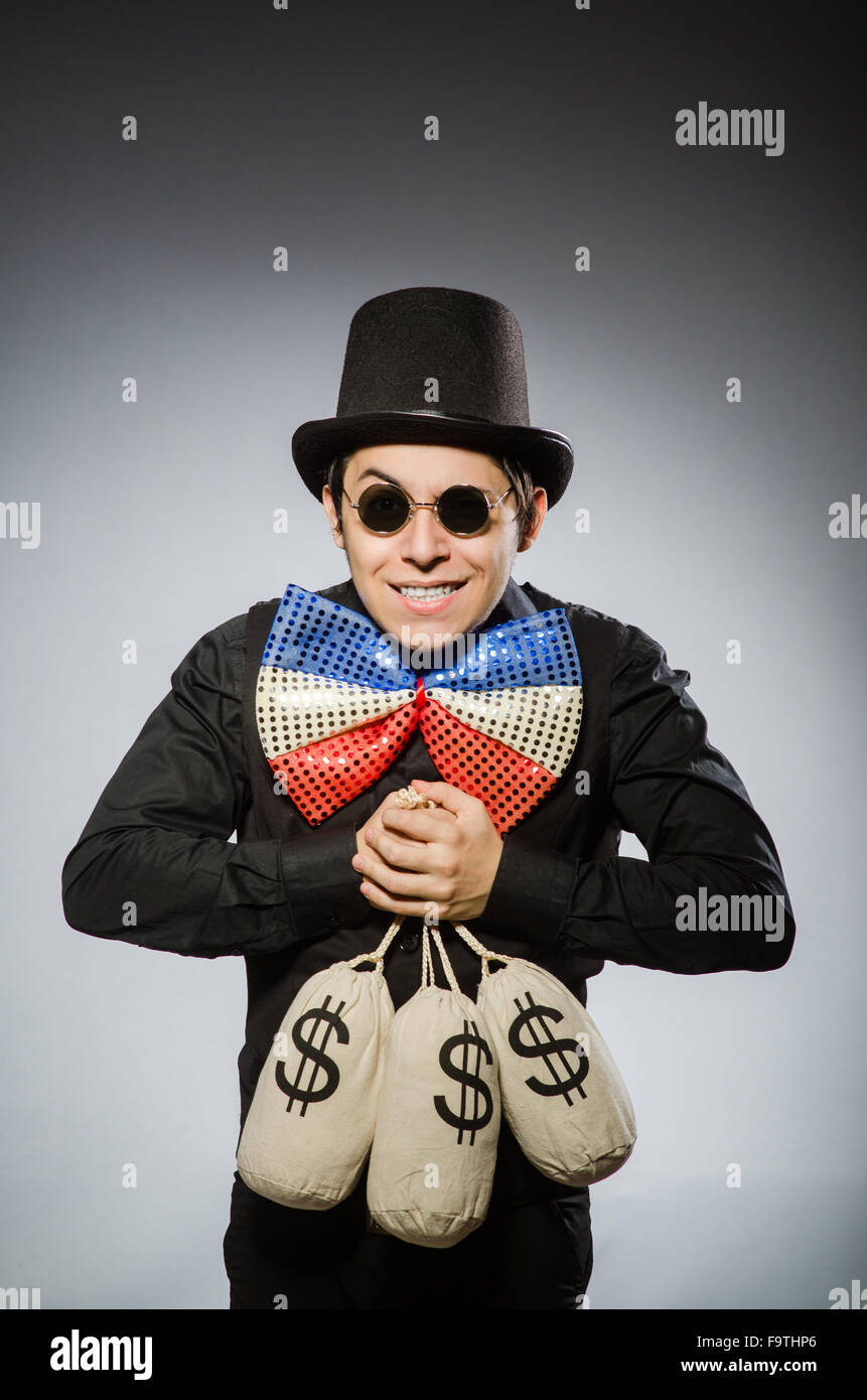 Funny man with money dollar sacks Stock Photo - Alamy