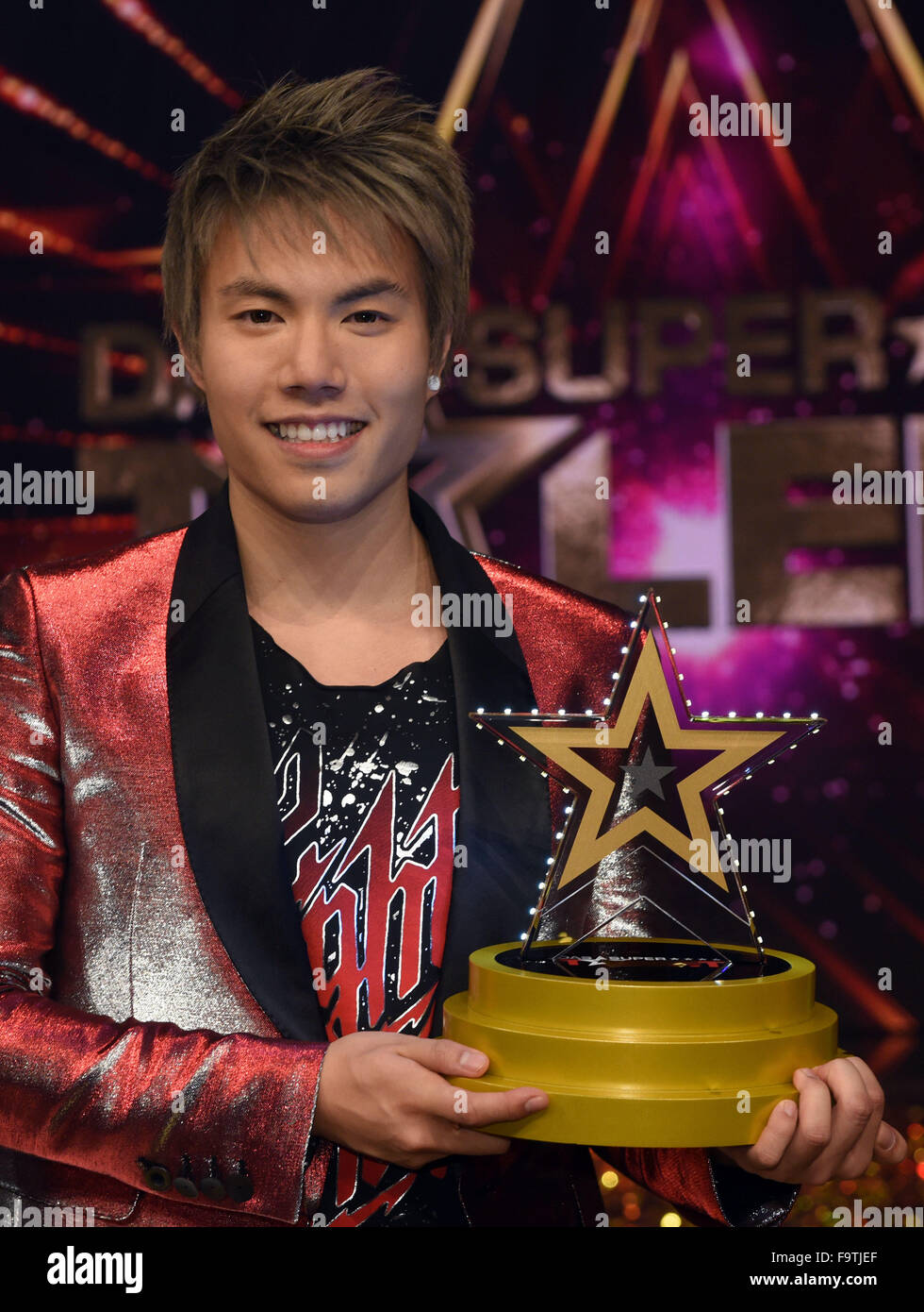 Cologne, Germany. 13th Dec, 2015. Singer Jay Oh celebrates holding his ...