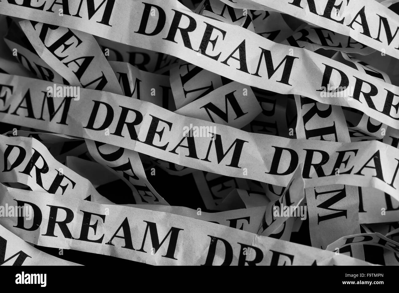 Crumpled paper pieces with word Dream Stock Photo - Alamy