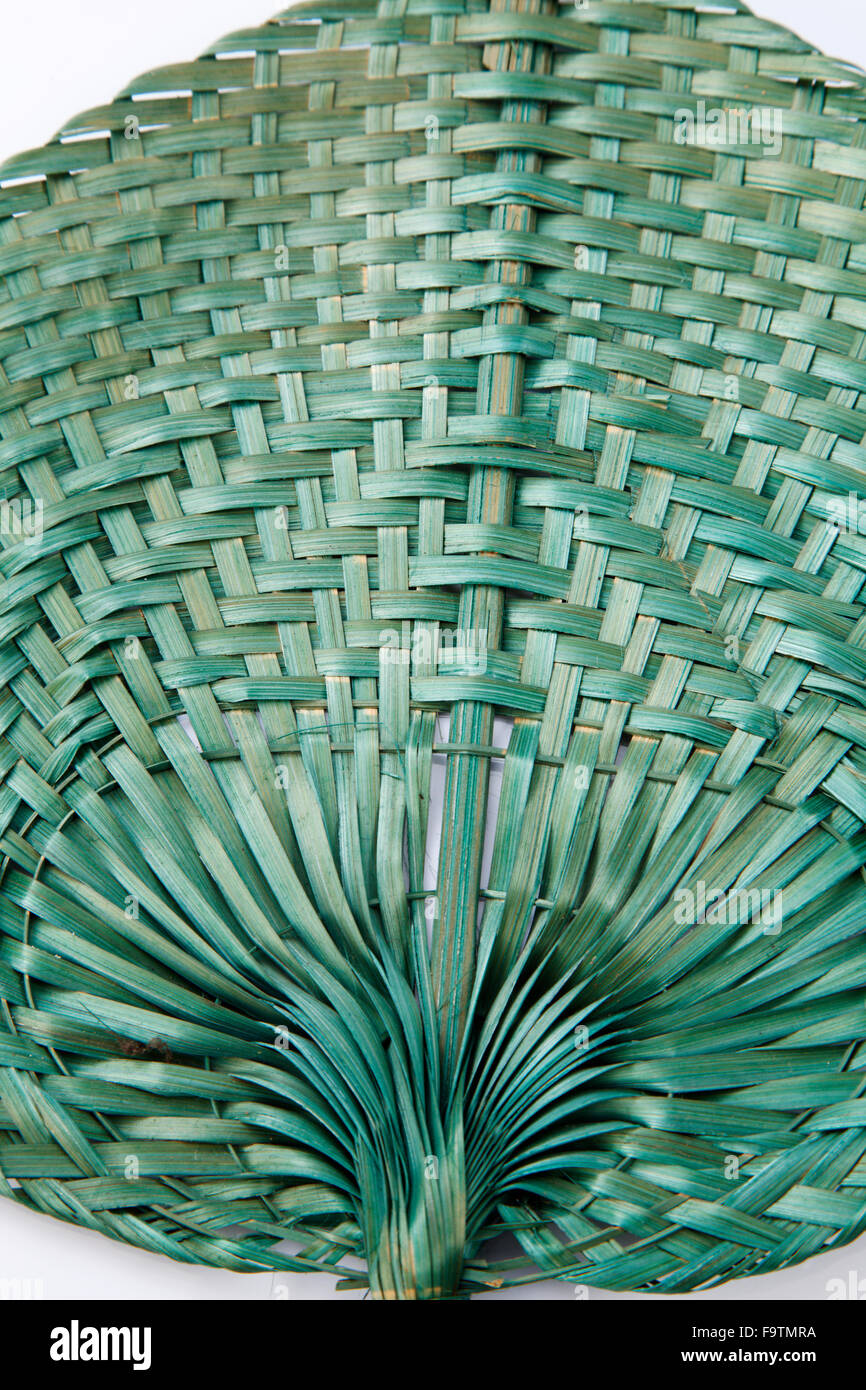 Green color native fan made from palm leaves on white background Stock ...