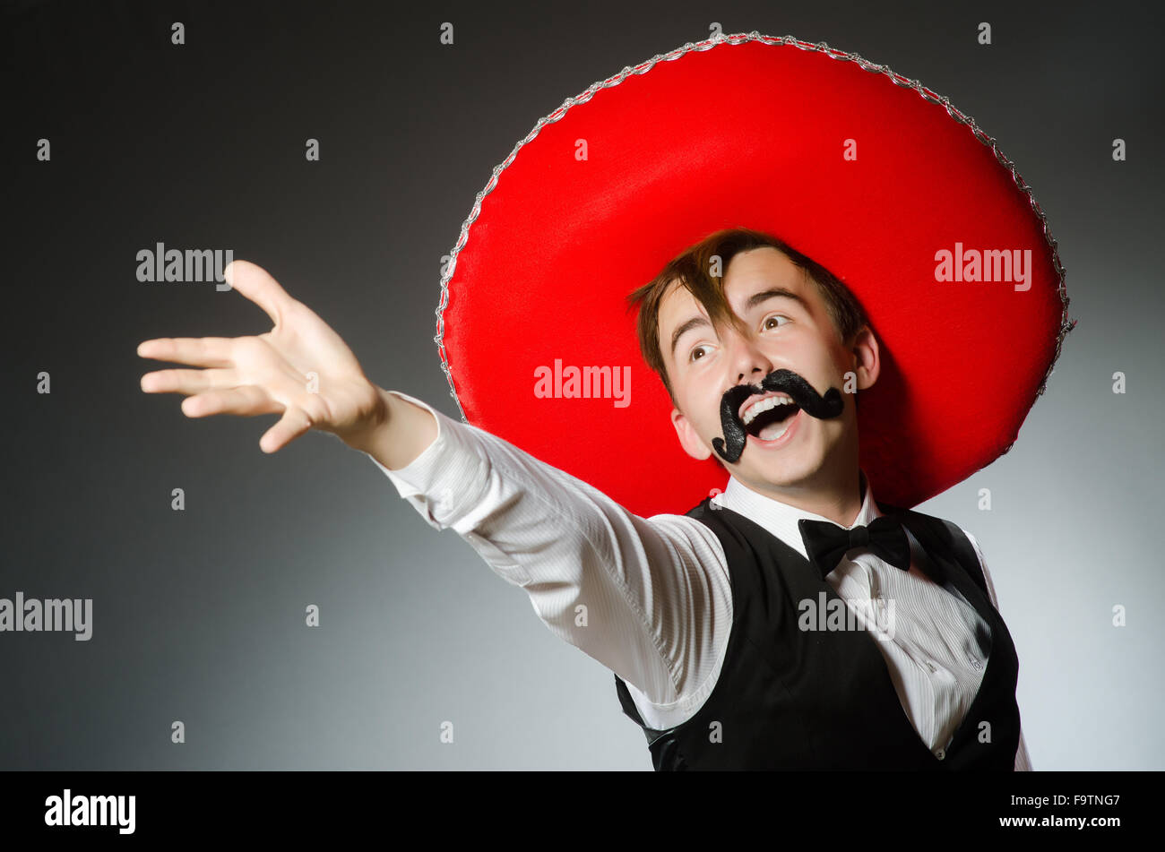Person wearing sombrero hat in funny concept Stock Photo - Alamy