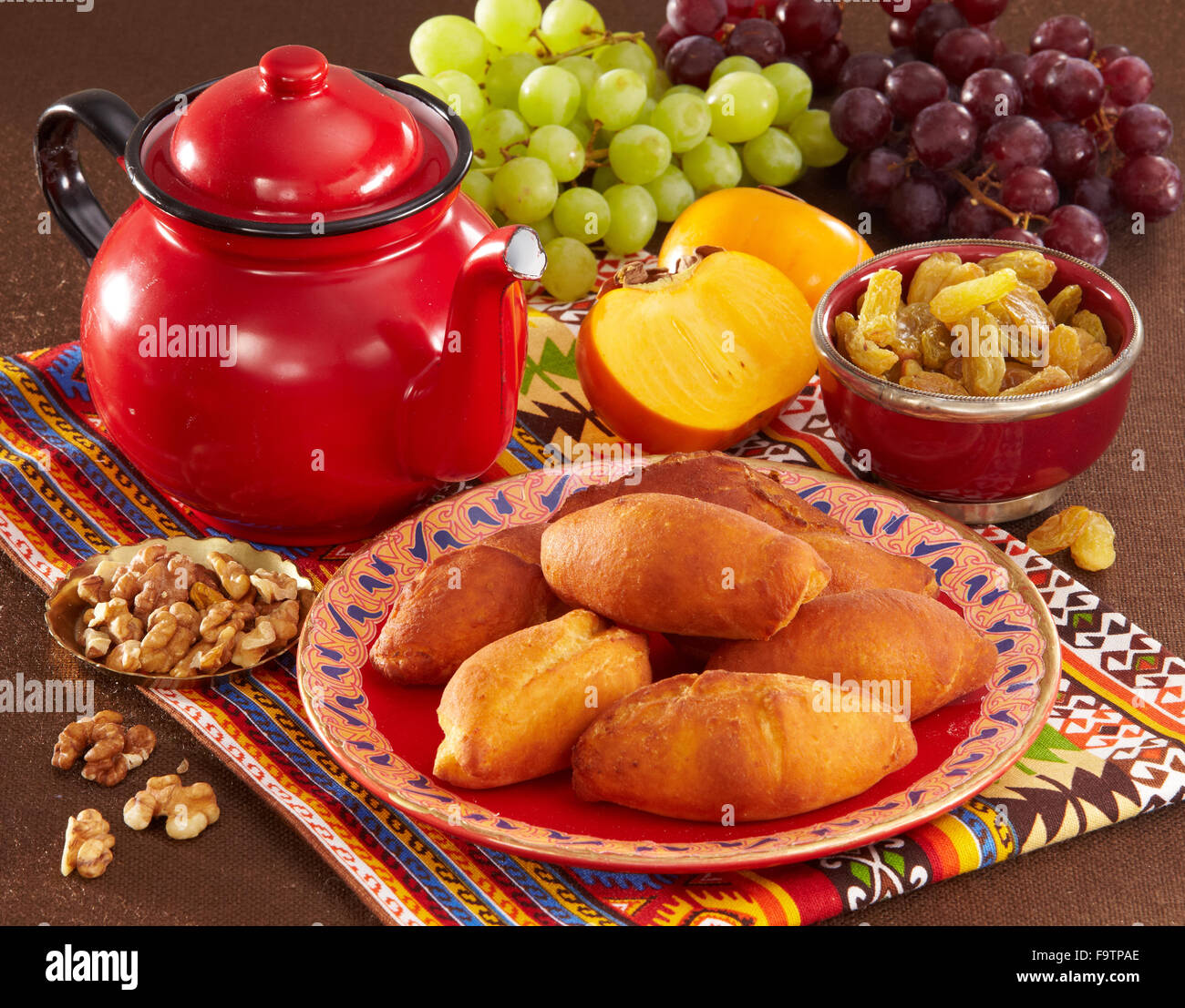Pirozhki (vol-au-vent) with kaki churma Stock Photo - Alamy